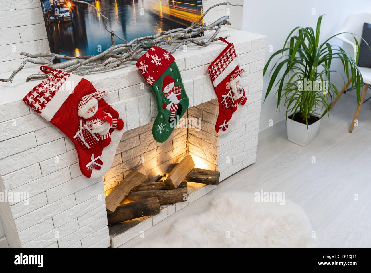 Christmas stocking on fireplace background Stock Photo - Alamy