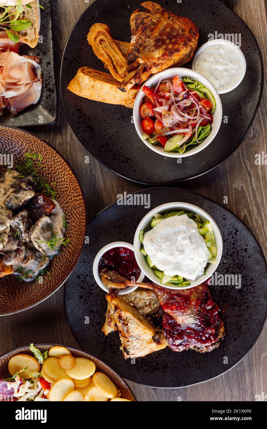 Vertical yummy, delicious roasted grill chicken and vegetable salads ...