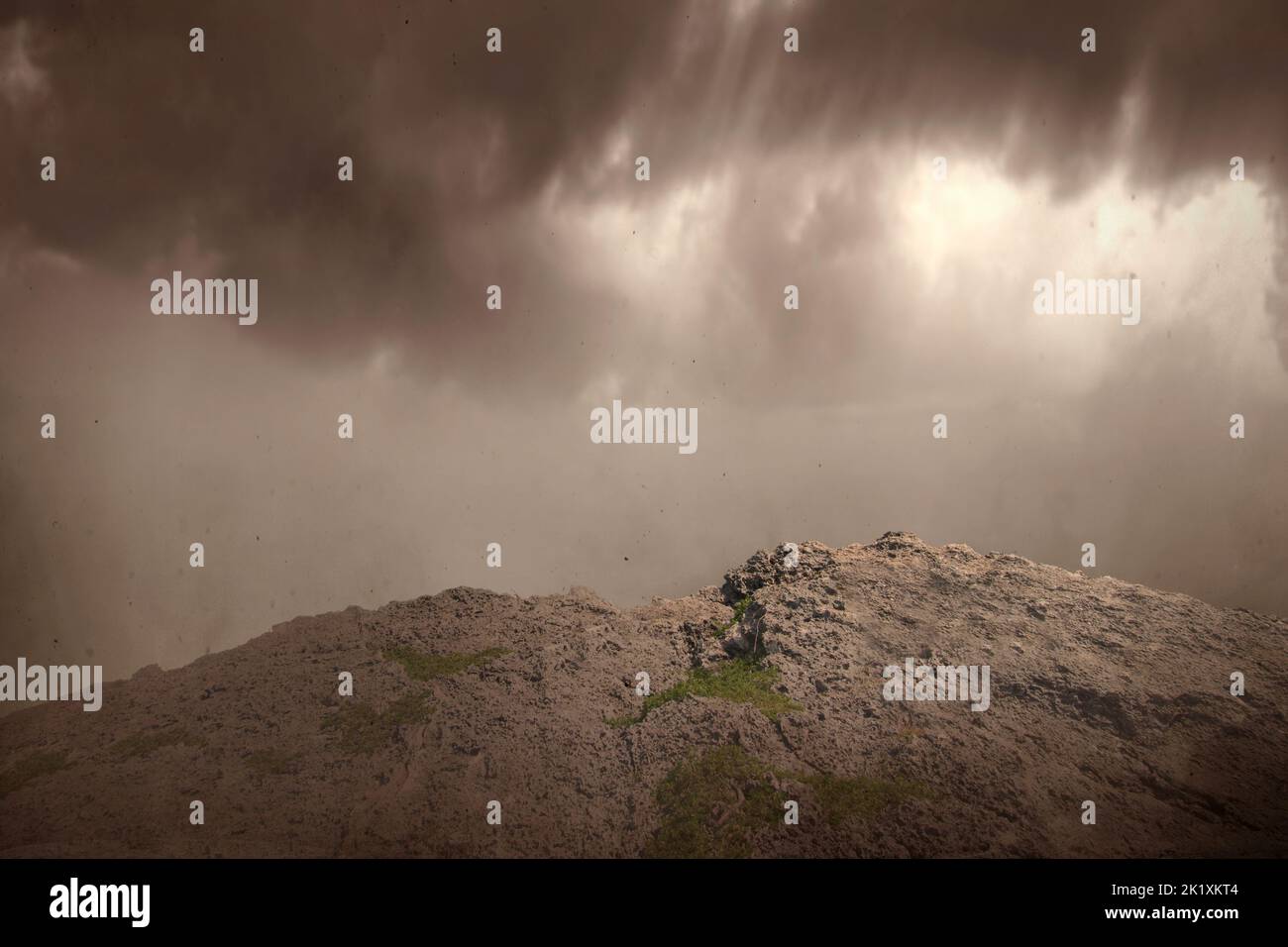 Spooky rock hills with foggy background Stock Photo - Alamy