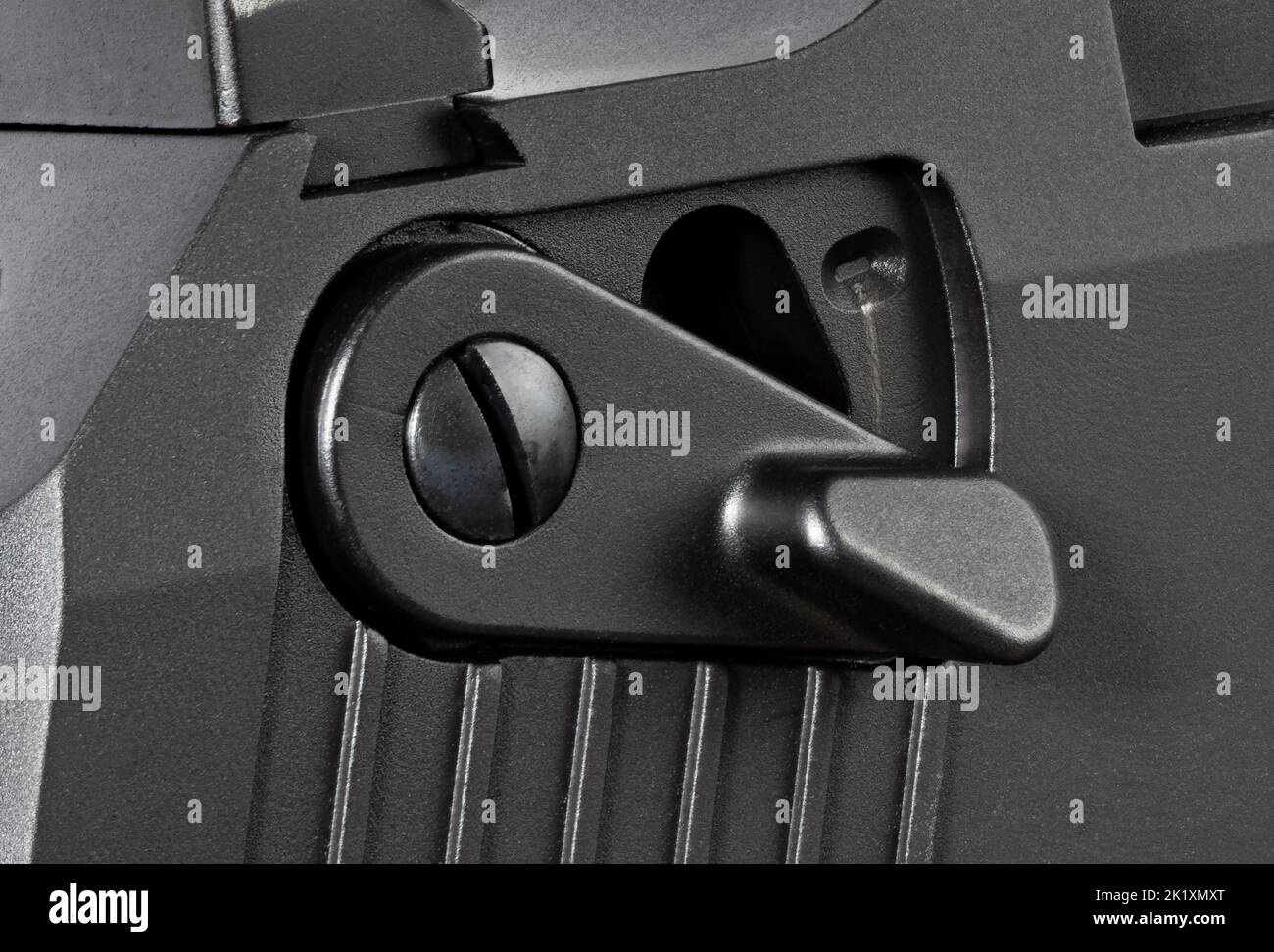 Safety engaged on a semi-automatic pistol making it impossible to pull ...