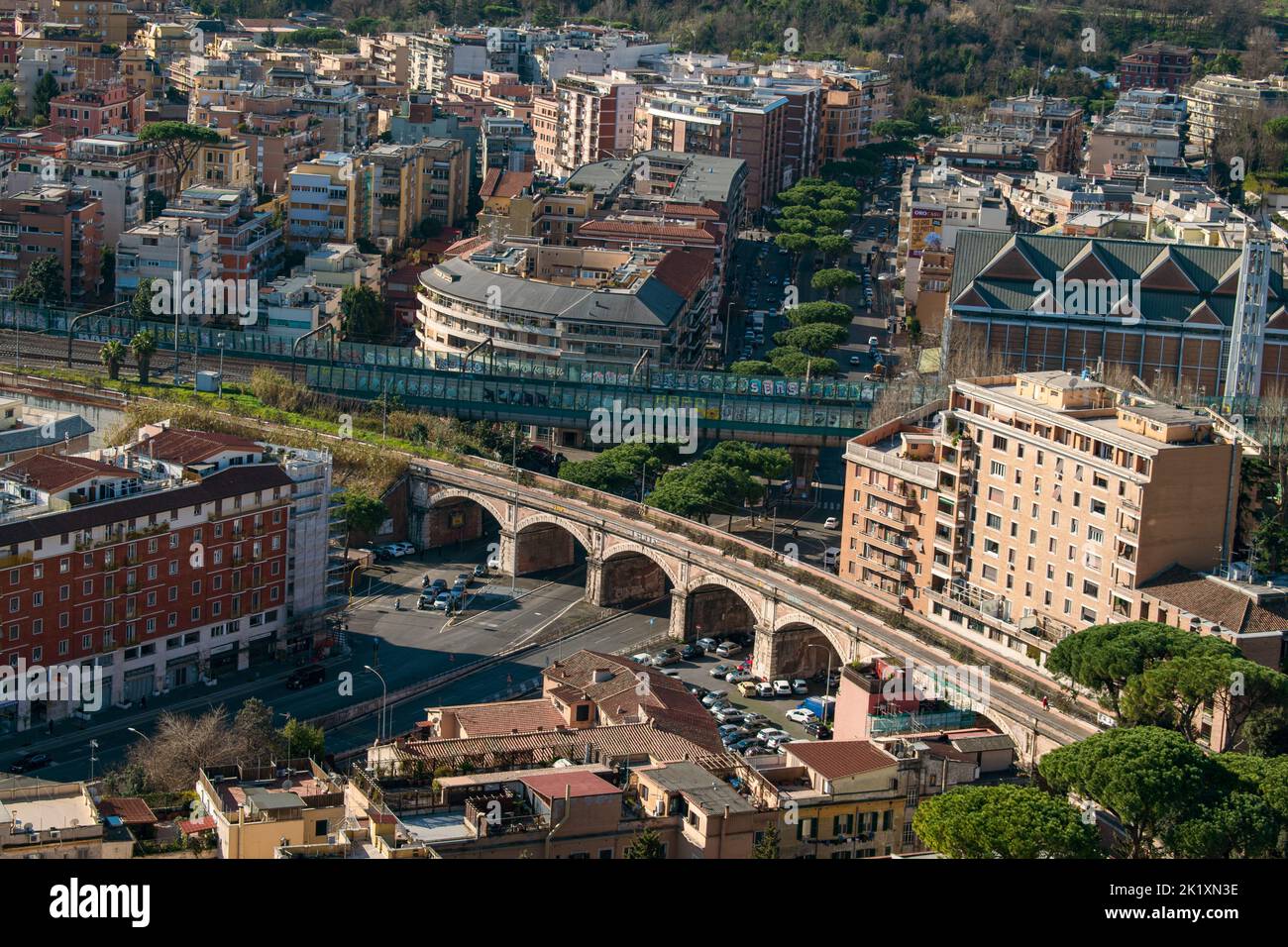 An aerial view of cityscape Rome surrounded by buildings Stock Photo ...