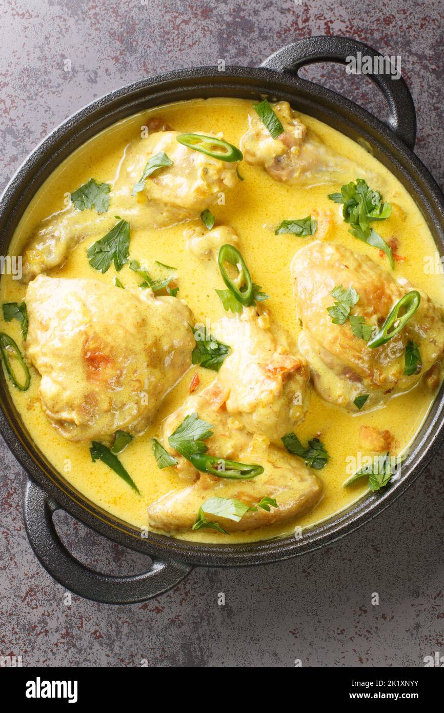 Kenyan Chicken in Coconut Sauce Kuku wa kupaka closeup in the plate on ...