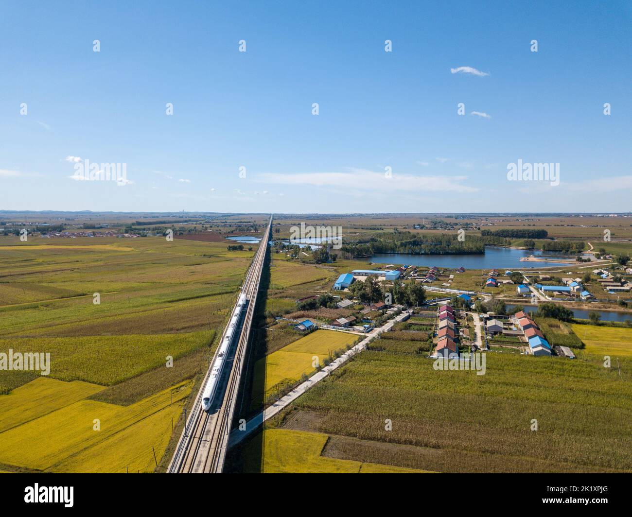 Train running in village aerial hi-res stock photography and images - Alamy