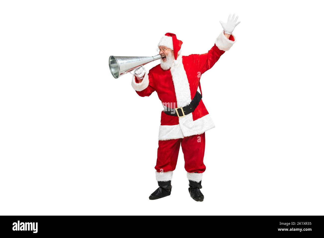 Portrait of senior man in image of Santa Claus shouting in megaphone ...