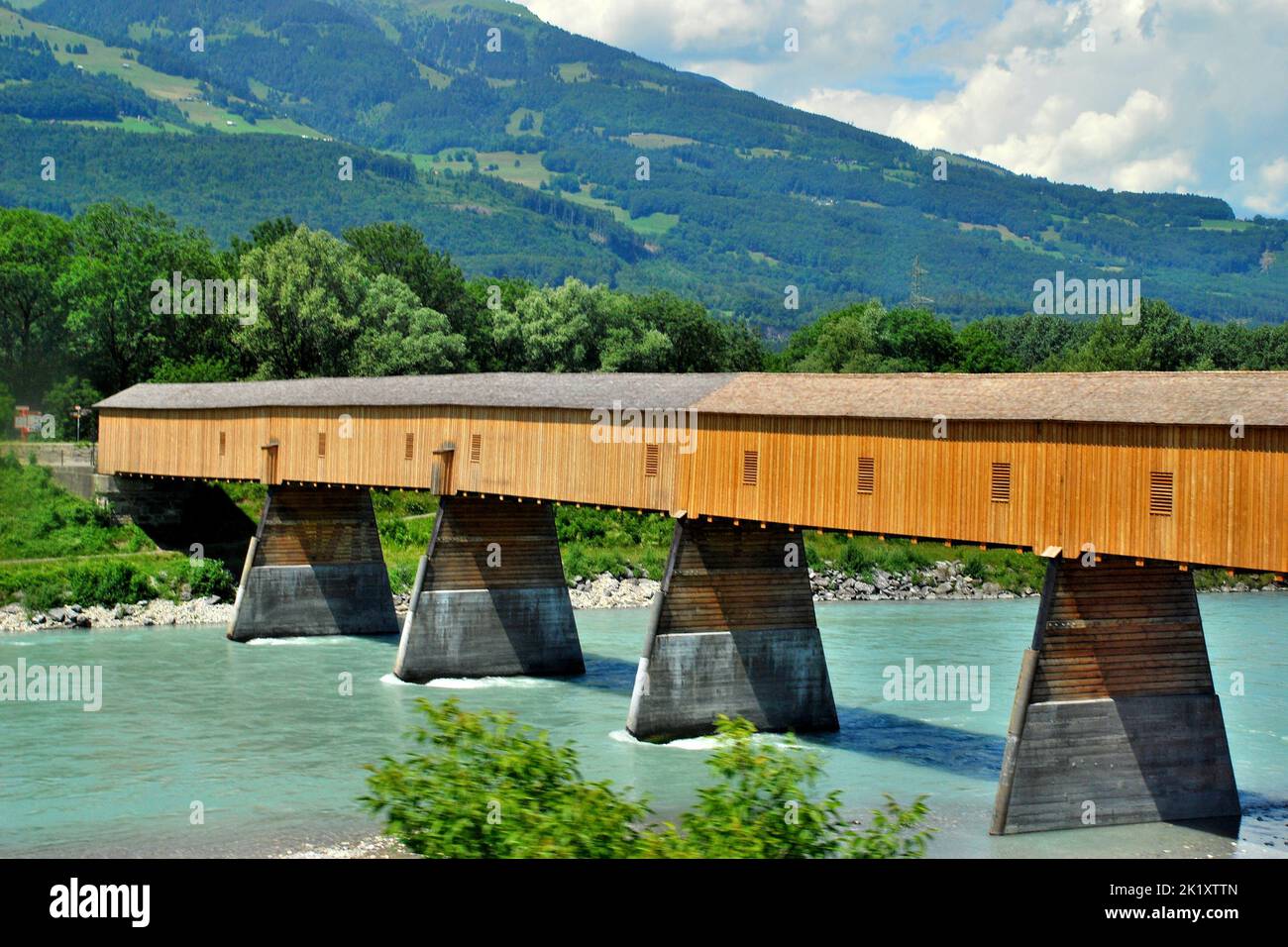 The Alte Rheinbrücke, an old wooden roofed bridge over the river Rhine ...