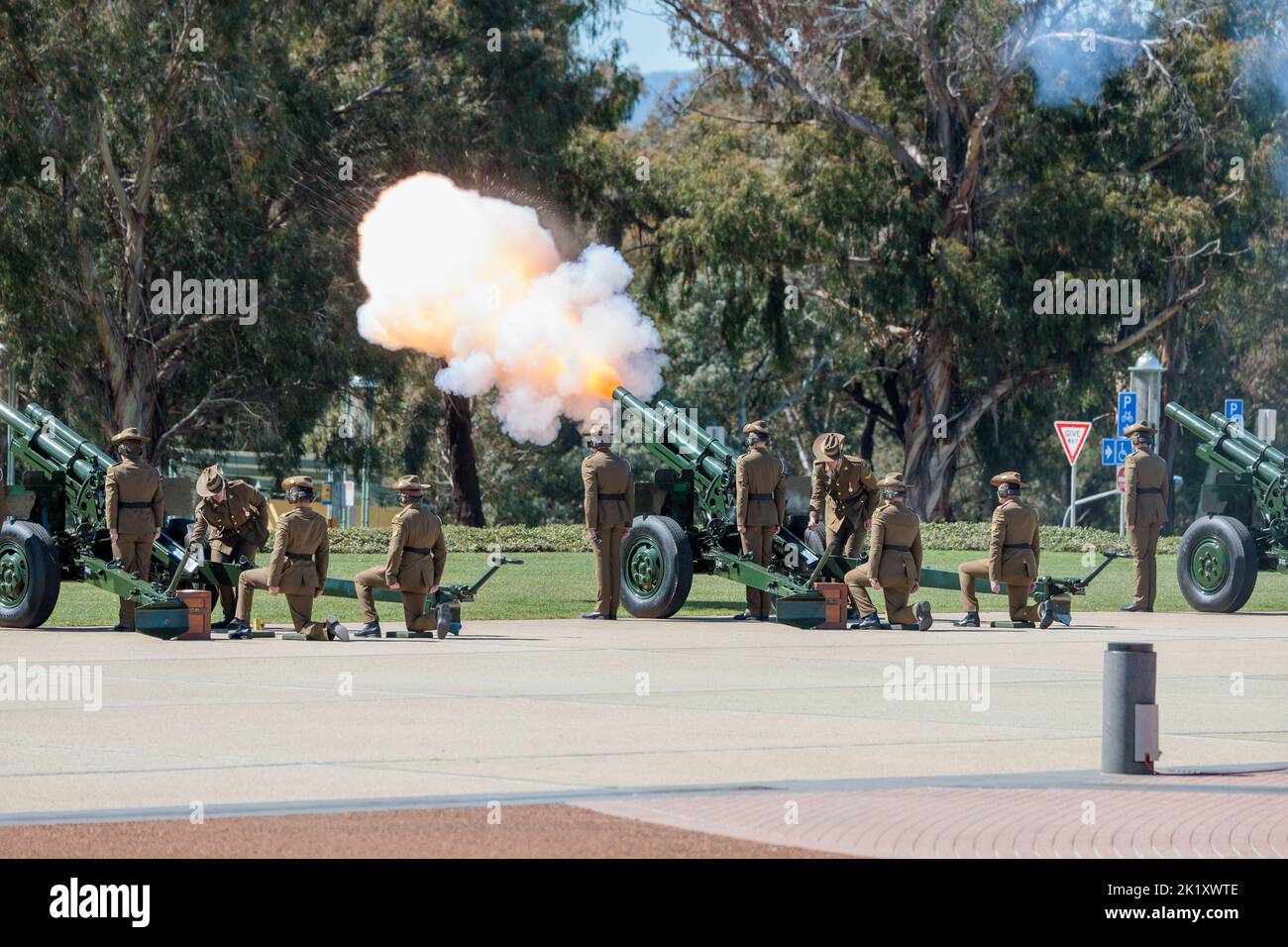 A cannon fires for the 21-gun salute at the Parliament House forecourt ...