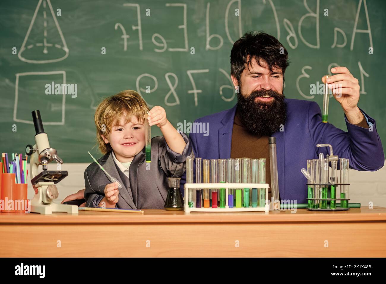 laboratory research and development. Back to school. teacher man with ...