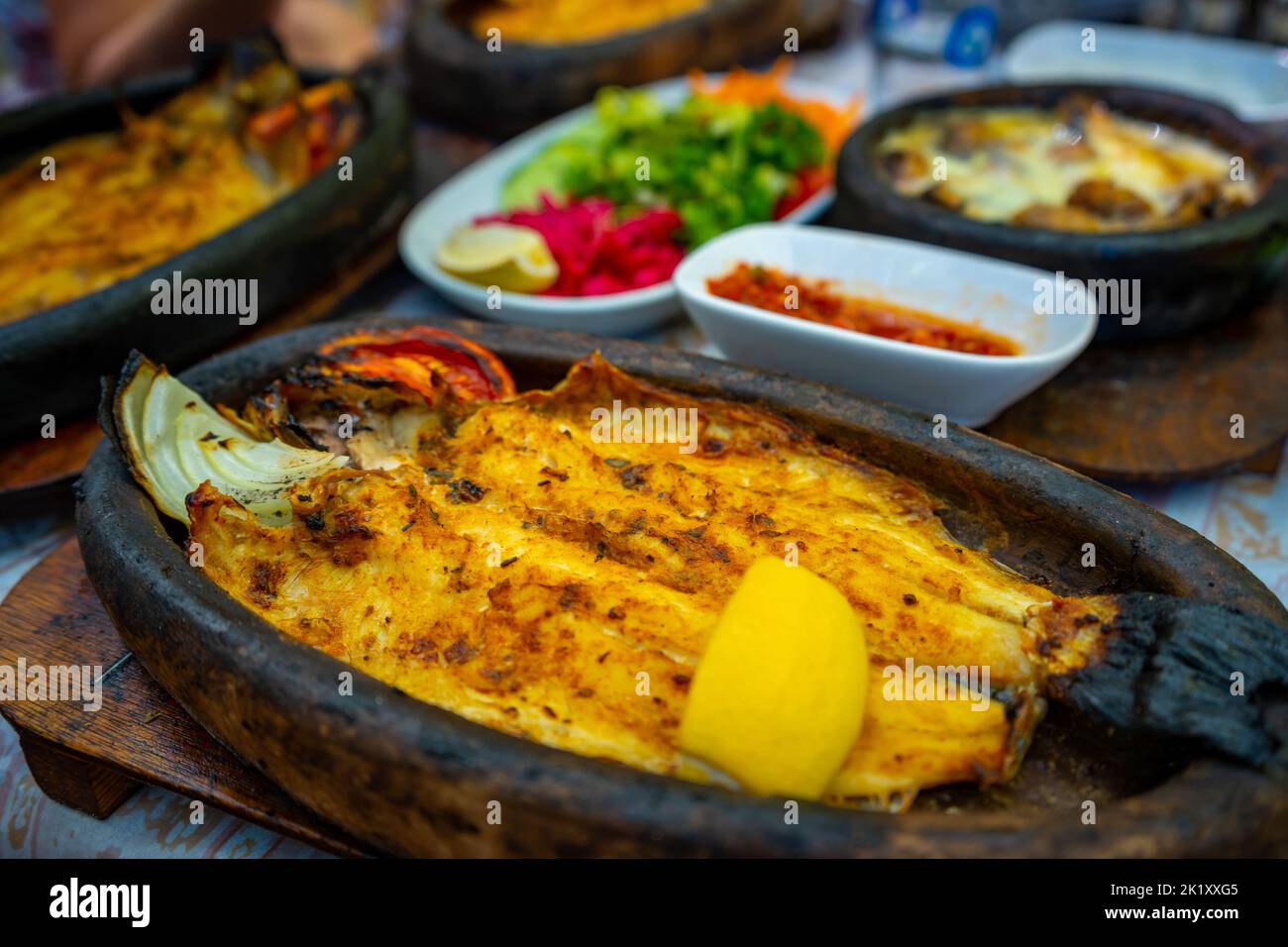 Fish dish in Tropic restaurants on the river. Places on the river with ...
