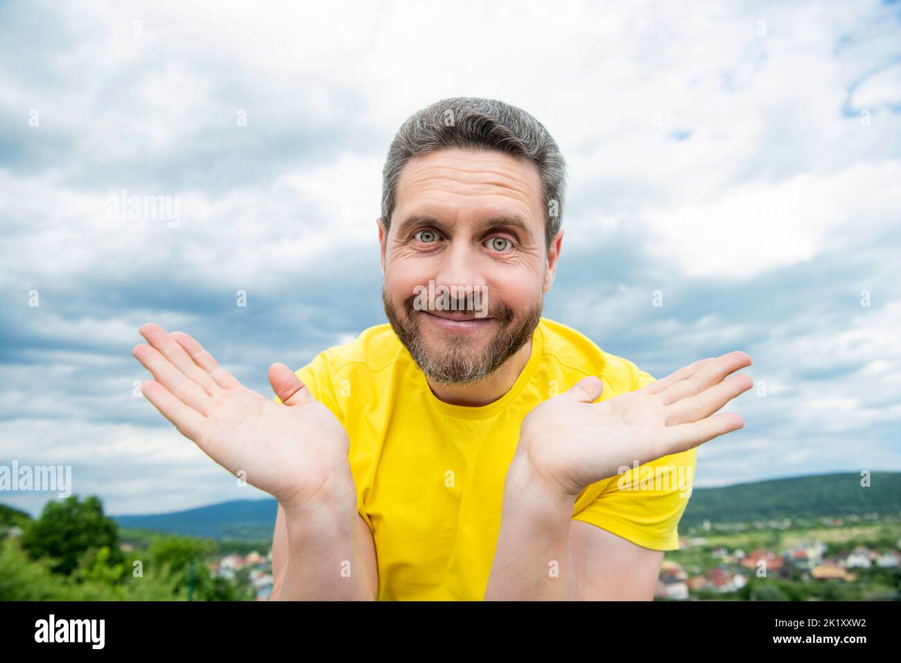 funny face of puzzled mature bearded man outdoor Stock Photo - Alamy