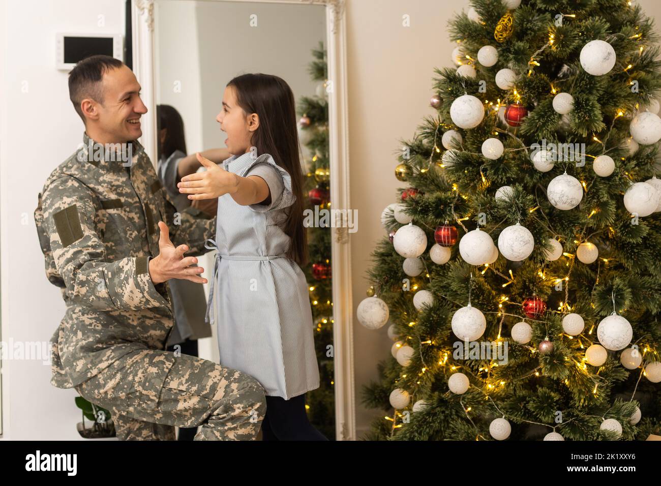 Christmas and Army. veteran and his daughter for christmas Stock Photo ...