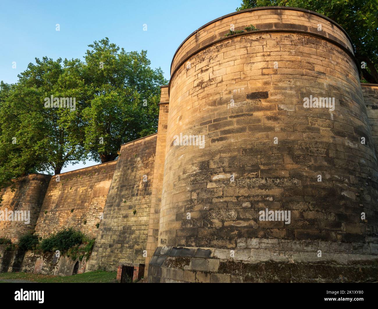 Nottingham Castle tower and outer bailey wall at sunrise Nottingham ...