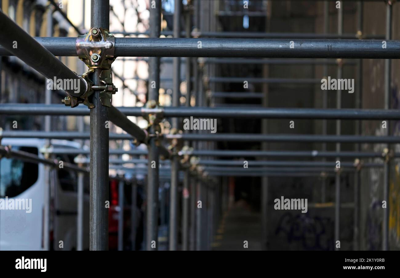 Construction to hold the scaffolding on a building in Naples, Italy ...