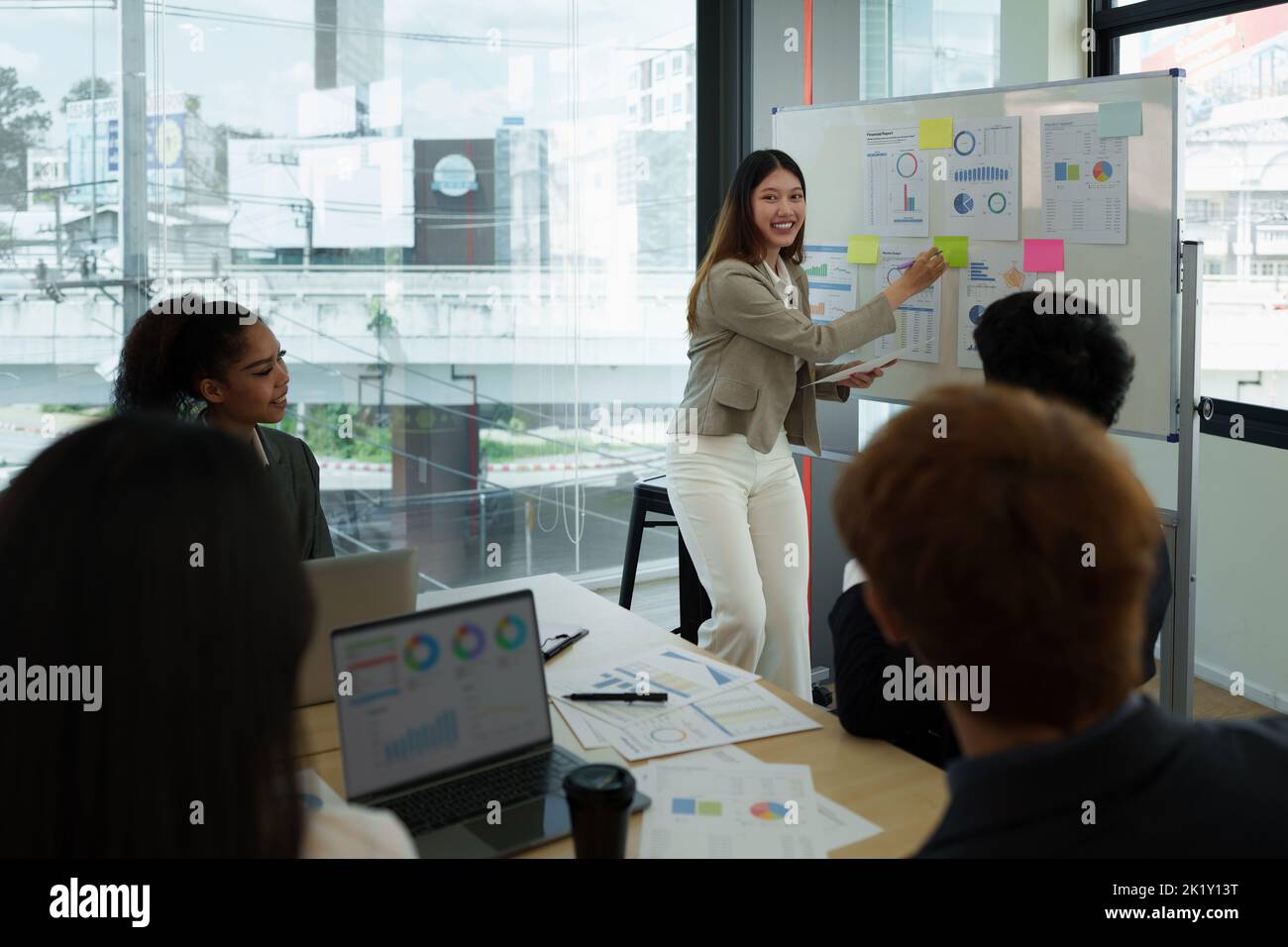 Group of Business people discussing working analyzing in board room ...
