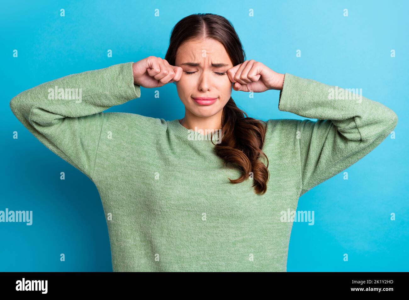 Portrait of unsatisfied disappointed lady crying arms fists wipe tears ...