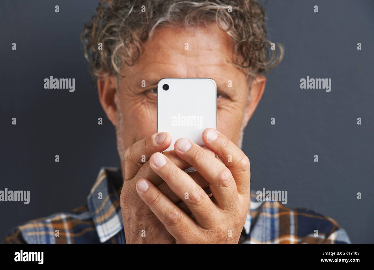 Wow.. 8 megapixels on my phone. A cropped front view shot of a mature ...