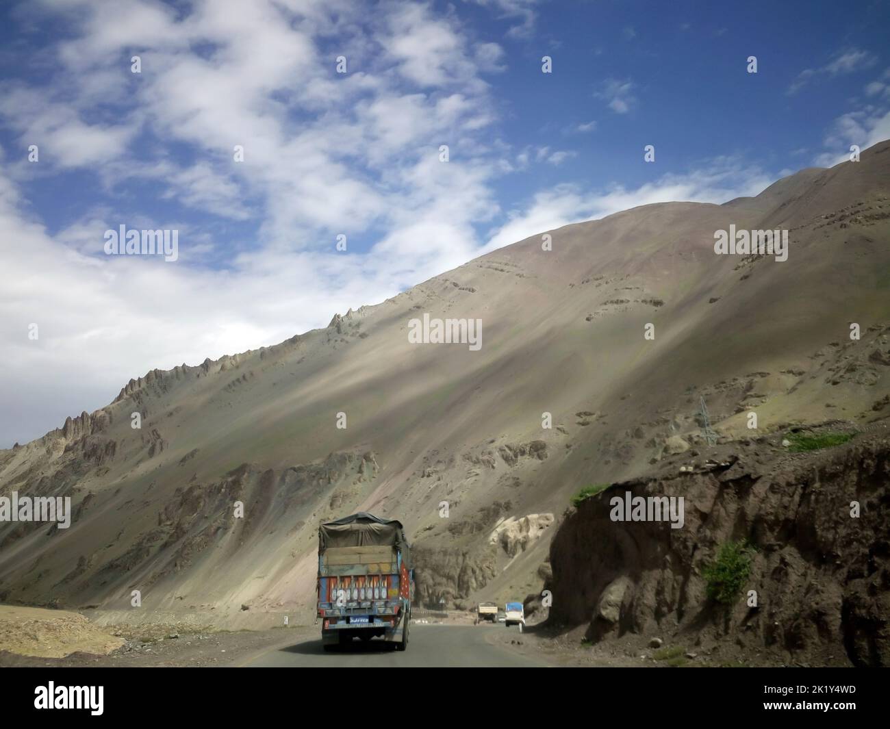 Indian lorry truck on road in the Himalayas near Tanglang la Pass ...