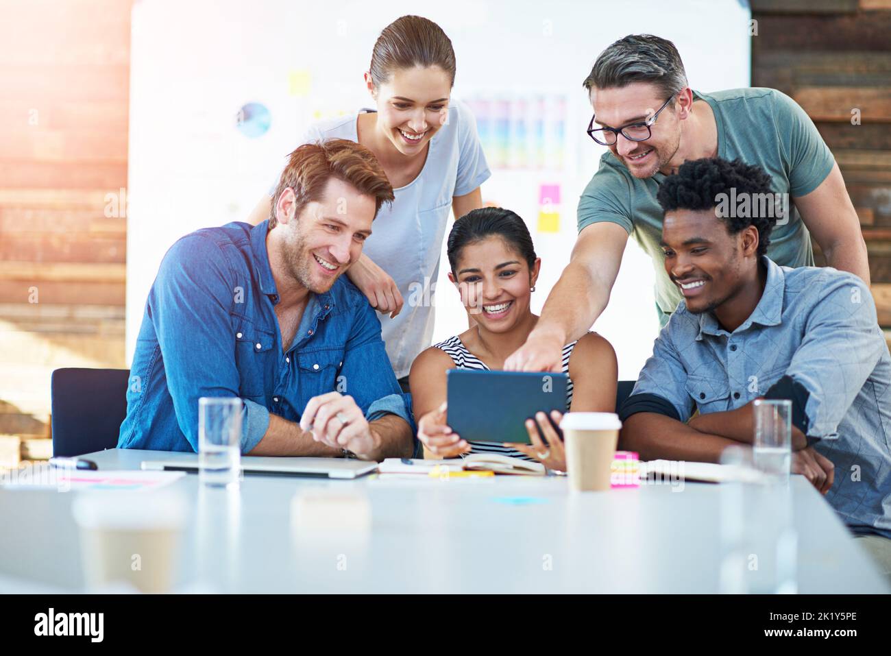 Streamlining their meetings with modern technology. a group of business ...