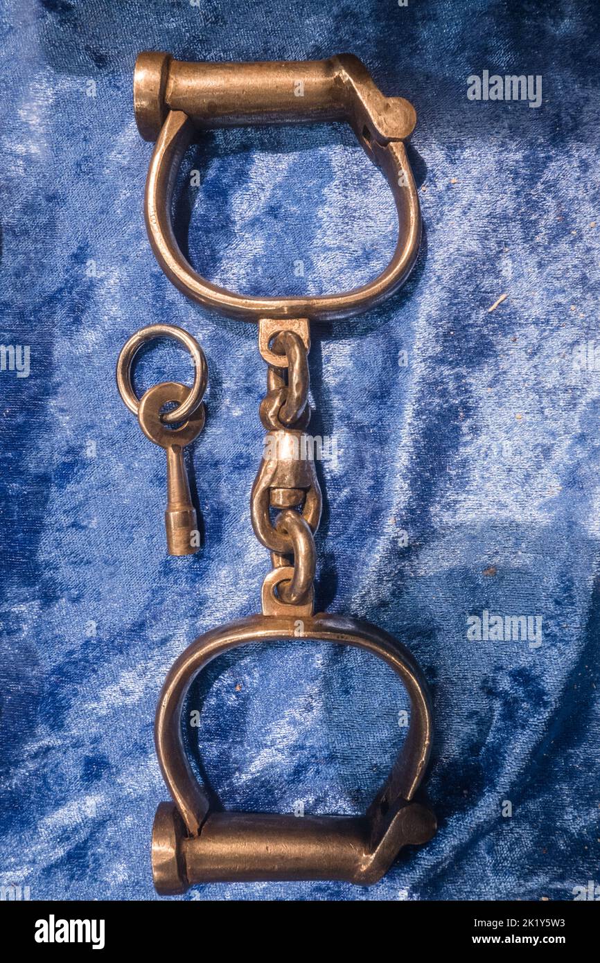 Victorian brass prison handcuffs Stock Photo - Alamy
