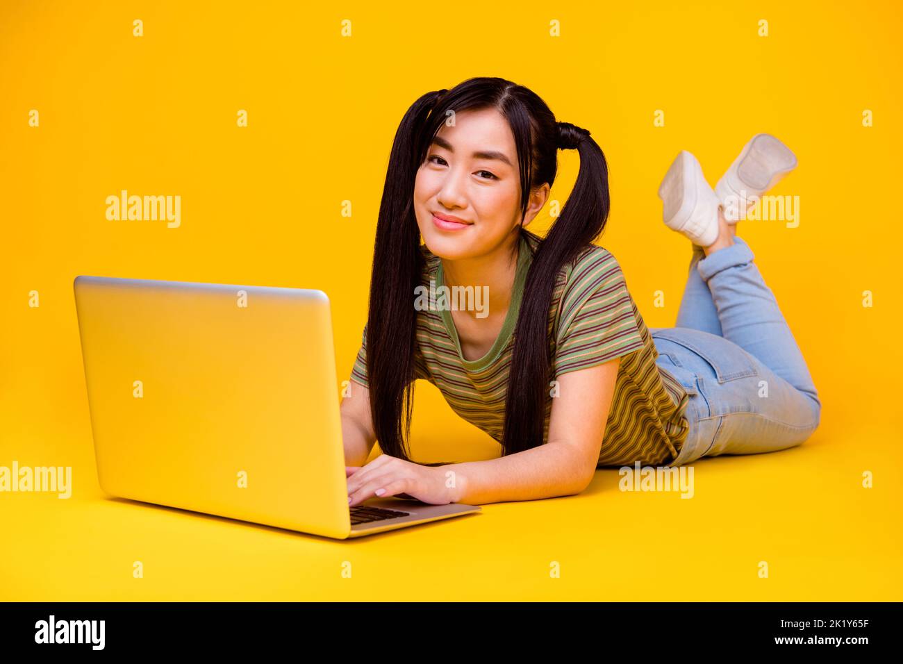 Photo of young good mood teenager girl studying remotely doing her ...