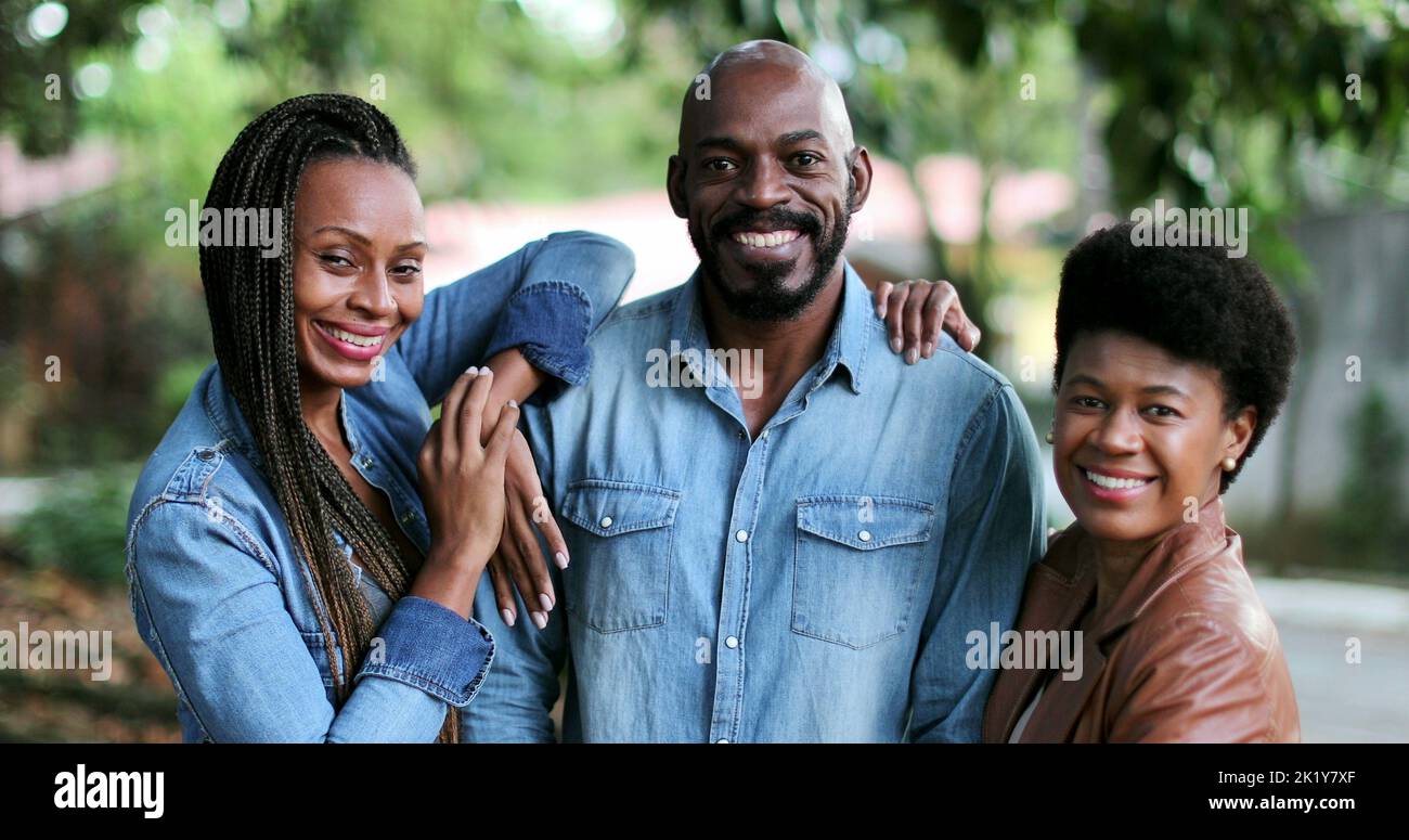 Brazilian people smiling, african ethnicity. three friends standing ...