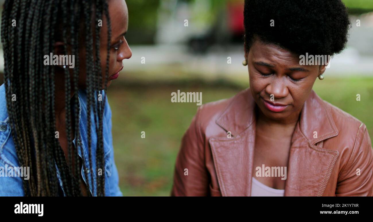 African women giving compassionate support to suffering friend Stock ...