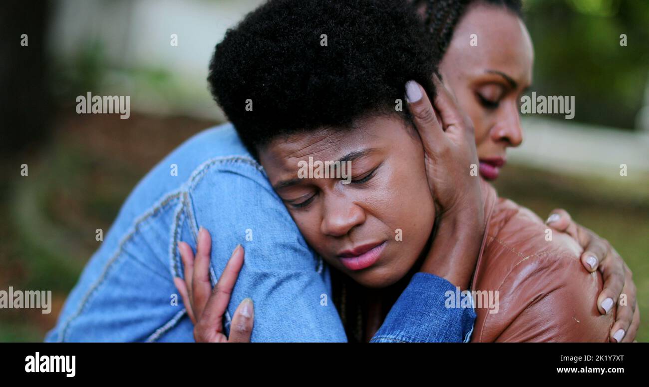 African women giving compassionate support to suffering friend Stock ...