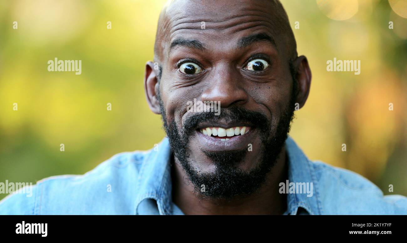 Black man surprise reaction, African guy portrait happy WOW Stock Photo ...