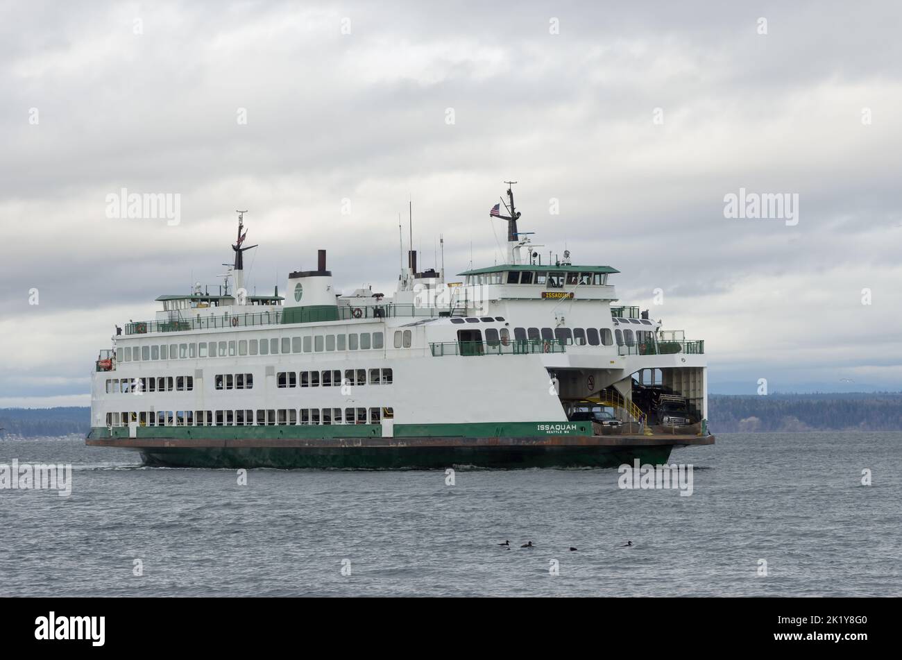 Ferry boat shown leaving on a cloudy day in Seattle, Washington Stock ...