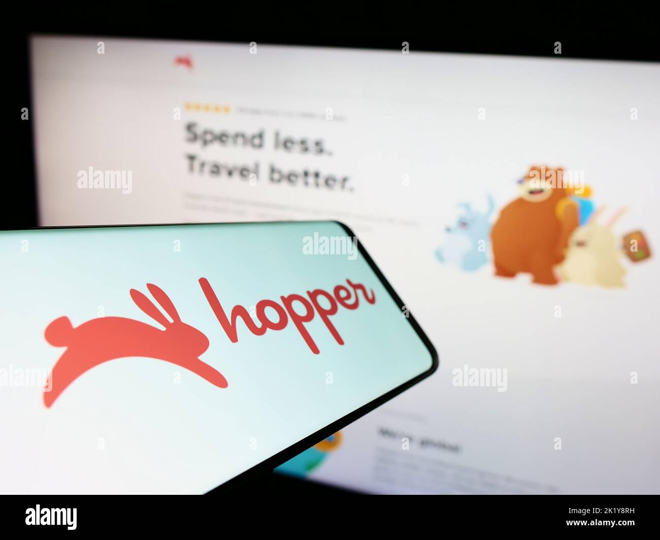 Smartphone with logo of Canadian travel company Hopper Inc. on screen ...