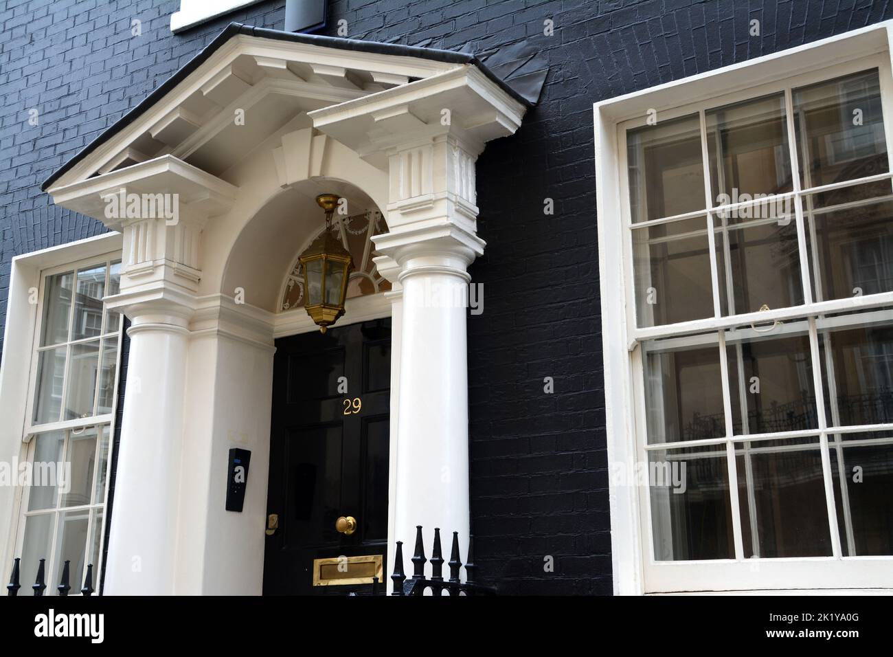 the luxury district of Kensington is characterized by elegant Georgian ...