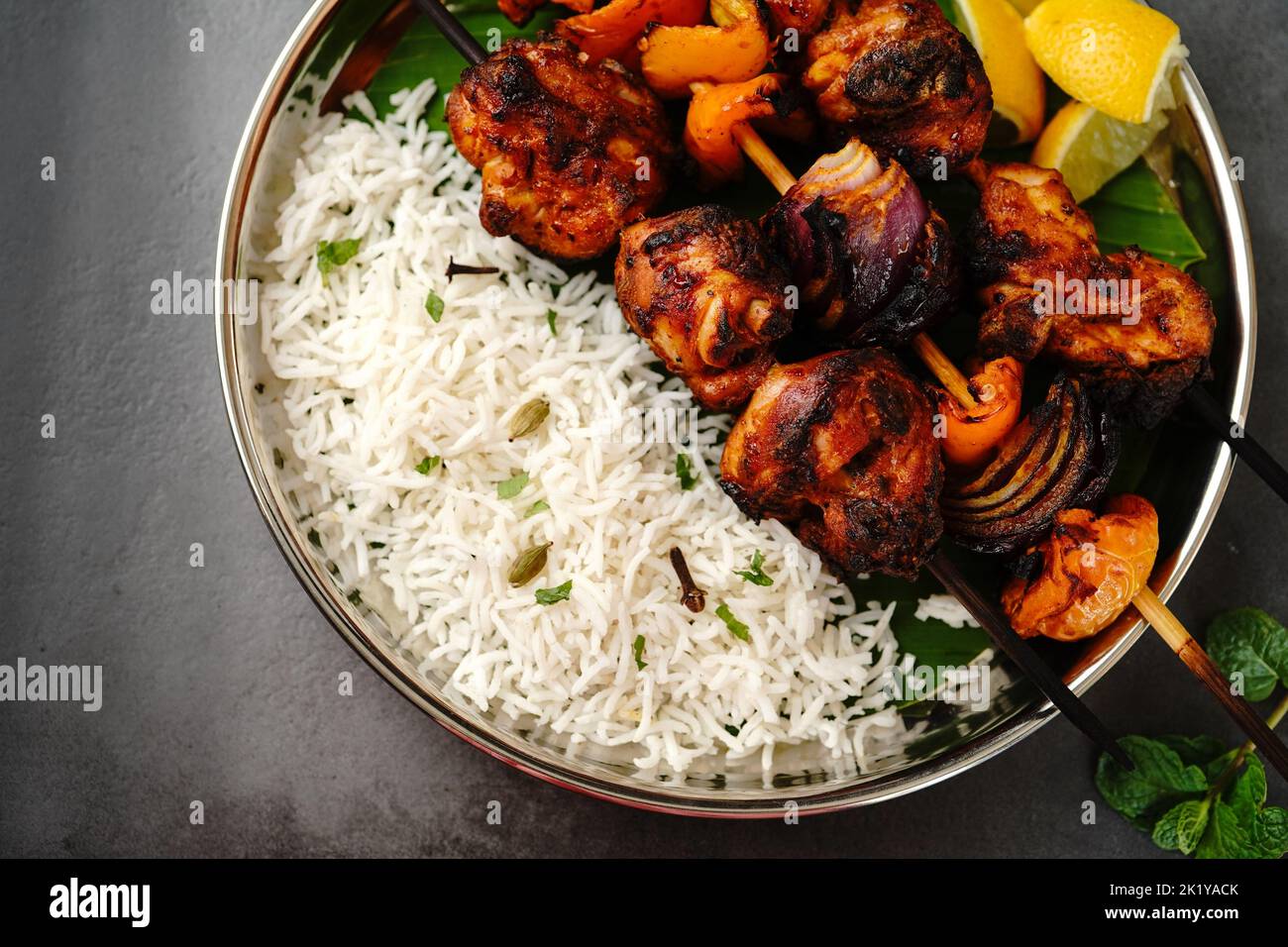 Grilled chicken tikka kabab served with basmati rice overhead view ...