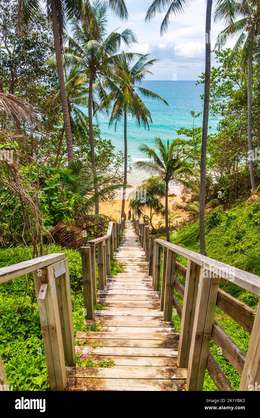 Wood stairs steps down to the Nai Thon Naithon Beach bay and landscape ...
