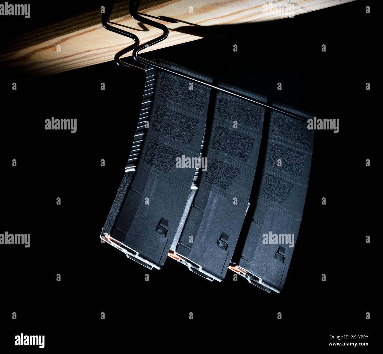 Wood shelf and wire rack holding loaded AR-15 magazines Stock Photo - Alamy