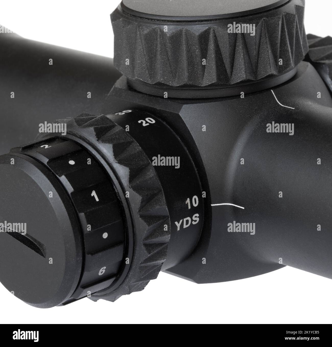 Parallax adjustment dial on a high power rifle scope isolated on white ...