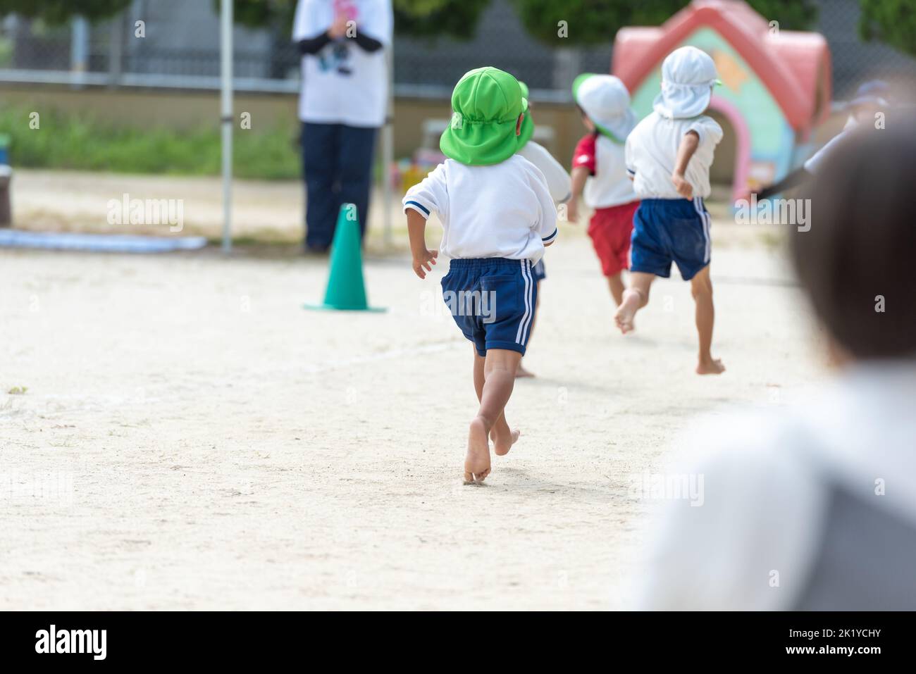 Children running on the ground during sports day at a Japanese ...