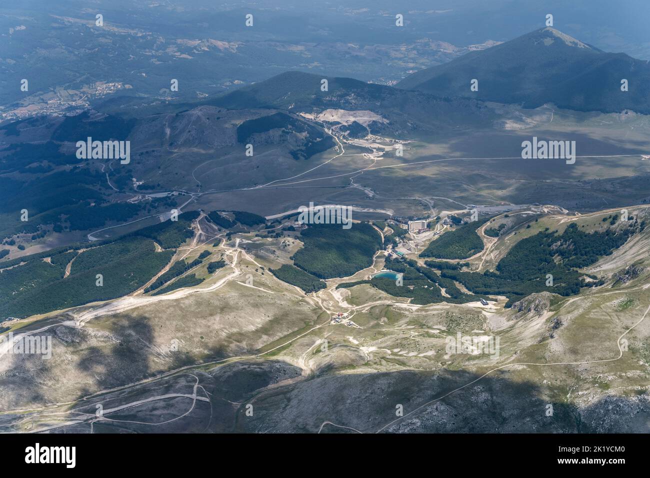 aerial shot, from a small plane, of Roccaraso mountain station, shot in ...
