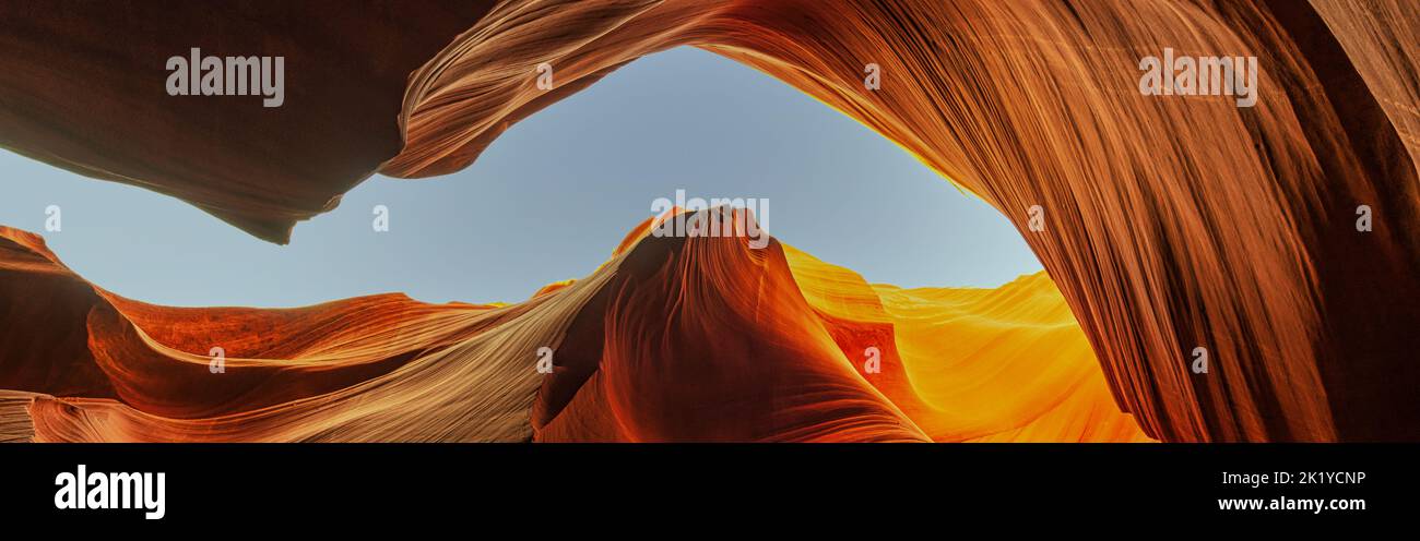 Antelope Canyon rock formations on the blue sky background Stock Photo ...