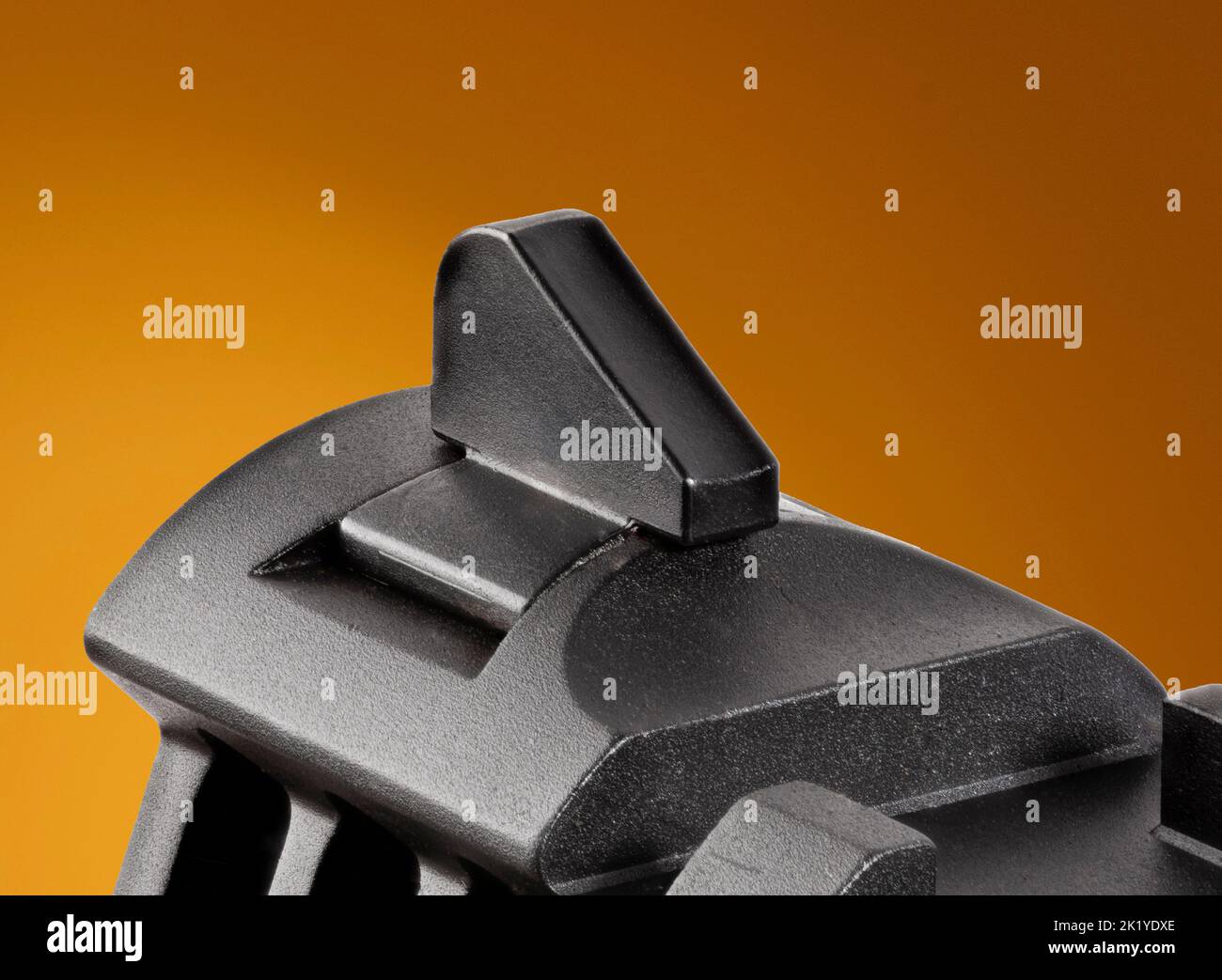 Front post sight on a pistol with an orange background Stock Photo - Alamy