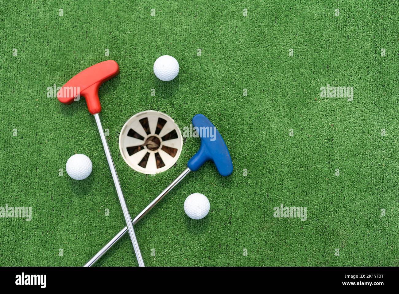 golf club, ball and hole Stock Photo - Alamy