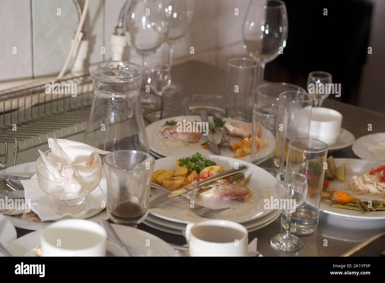 Dirty dishware on metal table Stock Photo - Alamy
