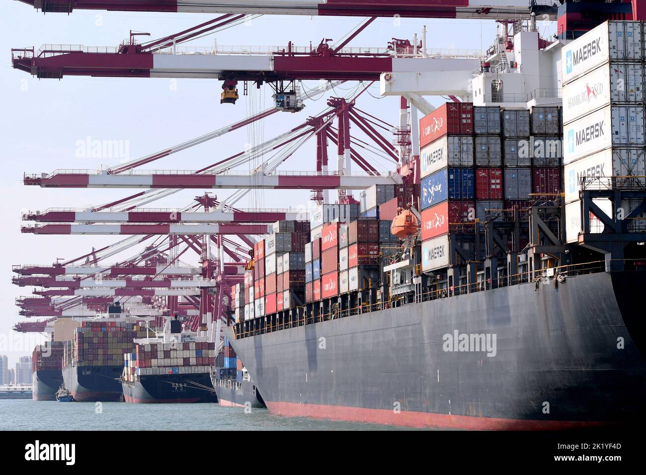 QINGDAO, CHINA - SEPTEMBER 21, 2022 - Freighters load and unload ...
