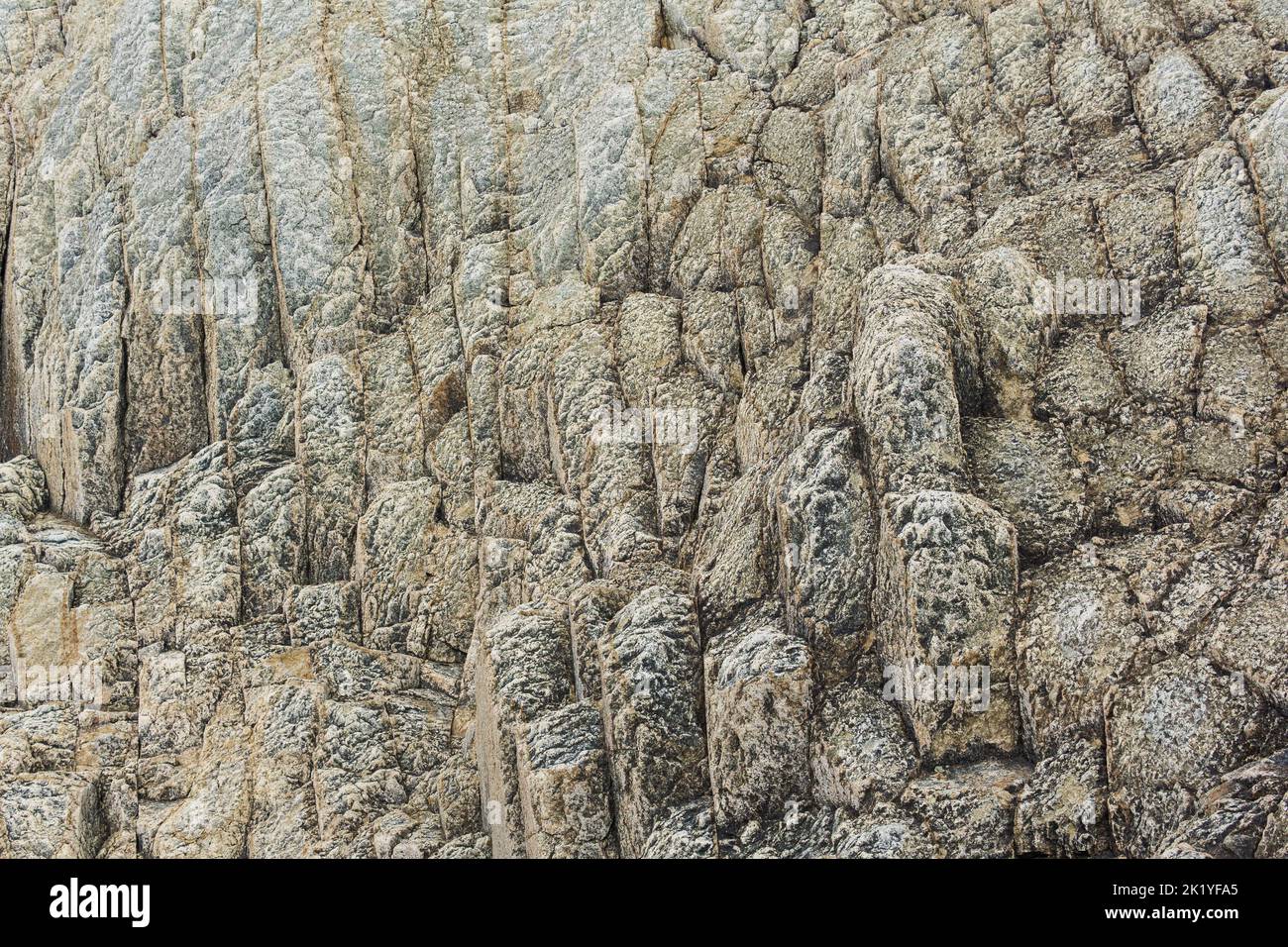 natural background, rock texture from weathered columnar basalt ...