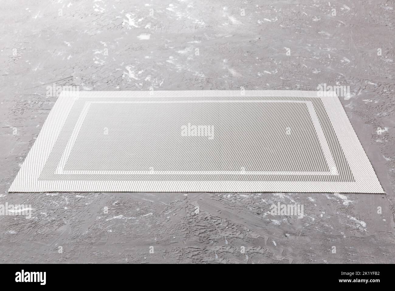 Perspective view of grey tablecloth for food on cement background ...