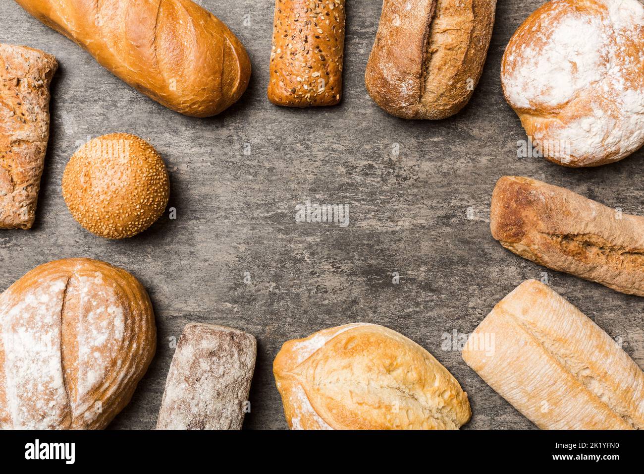 Homemade natural breads. Different kinds of fresh bread as background ...