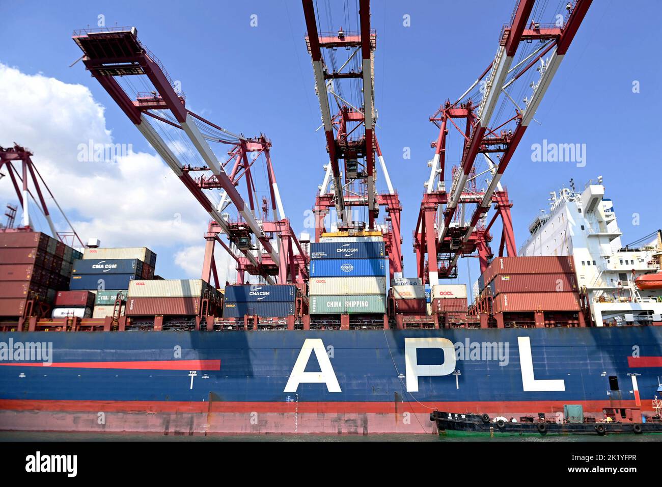 QINGDAO, CHINA - SEPTEMBER 21, 2022 - Freighters load and unload ...