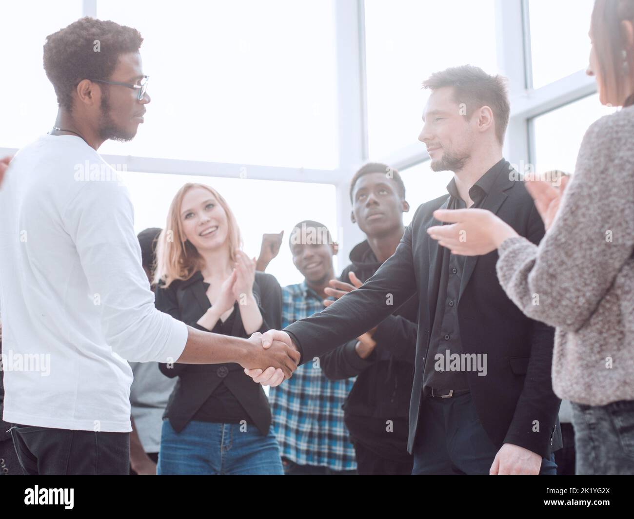 group of happy young people applauding their leaders Stock Photo - Alamy