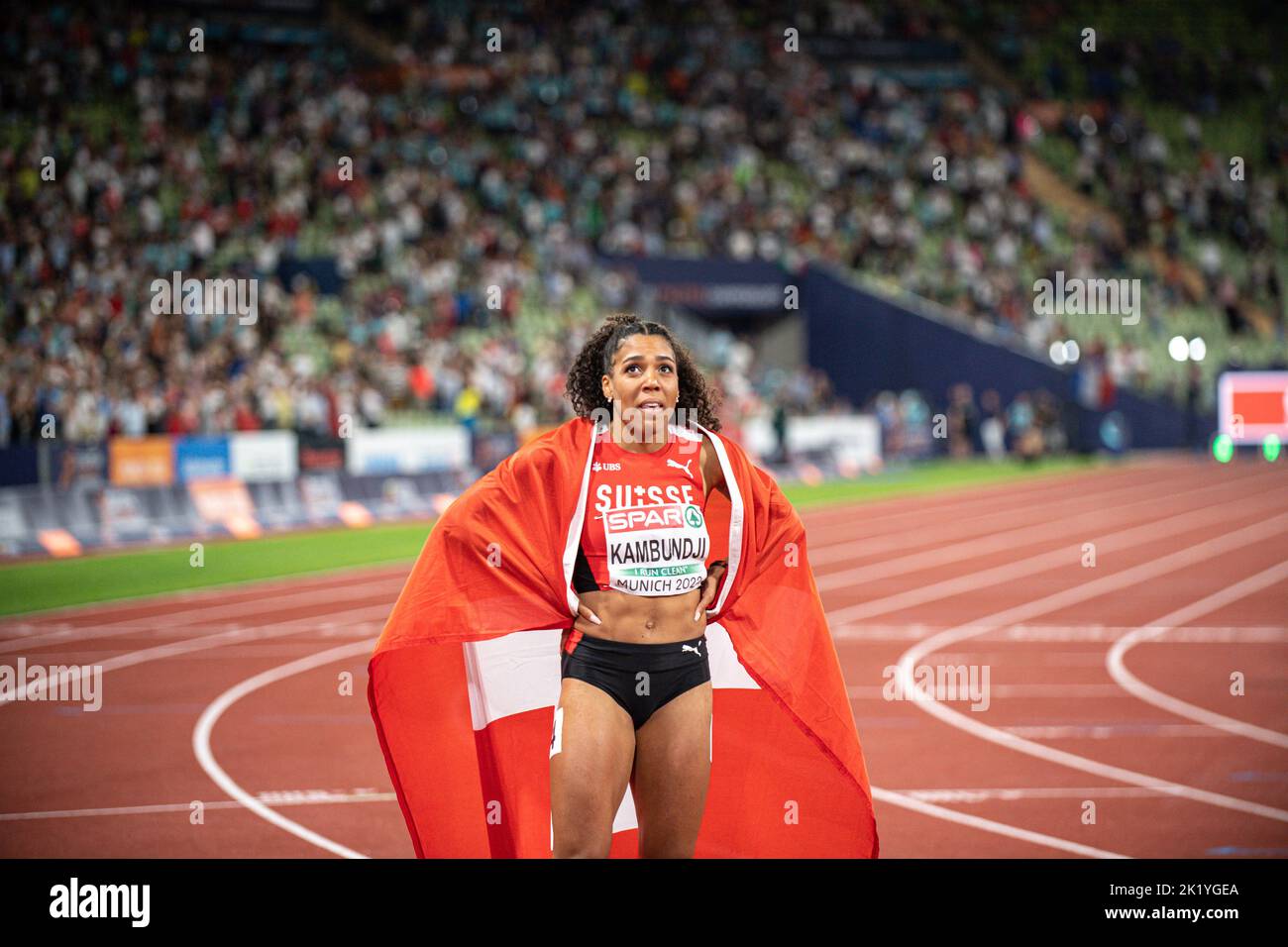 Mujinga Kambundji with her country's flag of the 200 meters at the ...