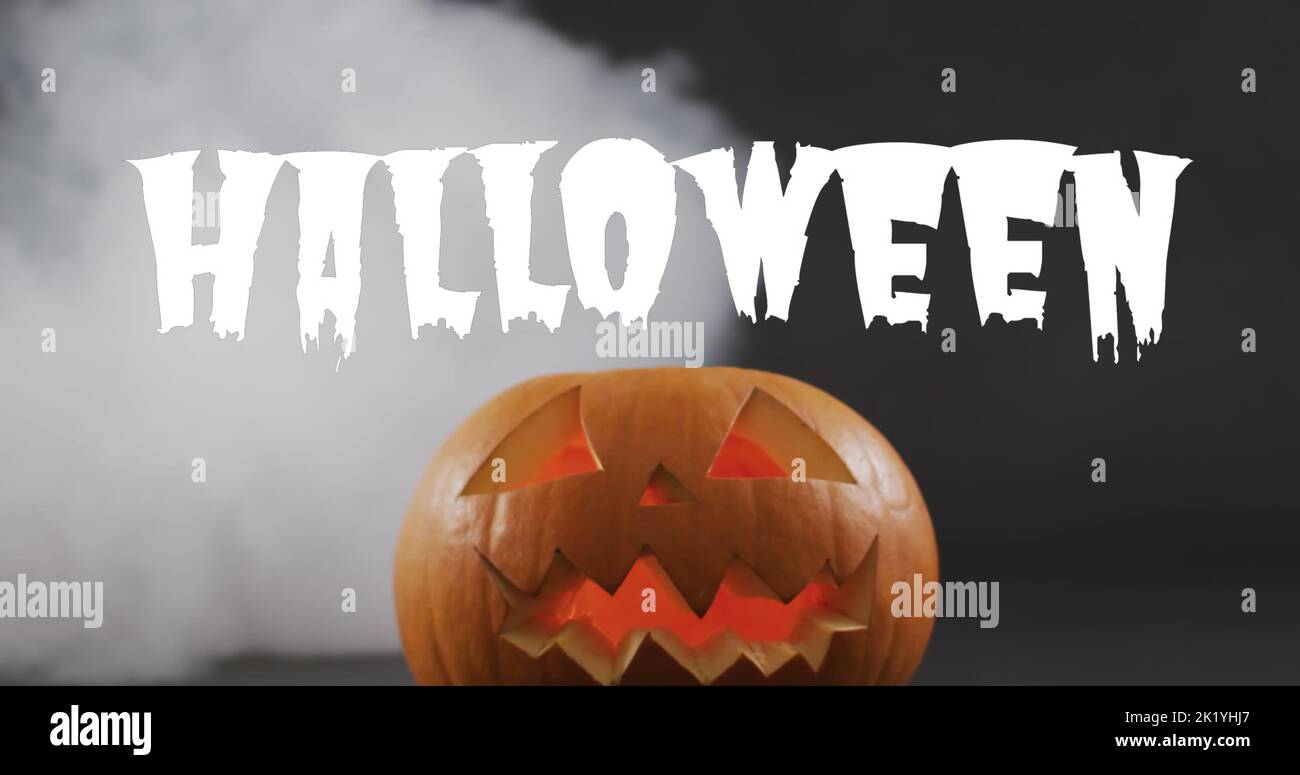 Image of halloween text over carved pumpkin on black background Stock ...