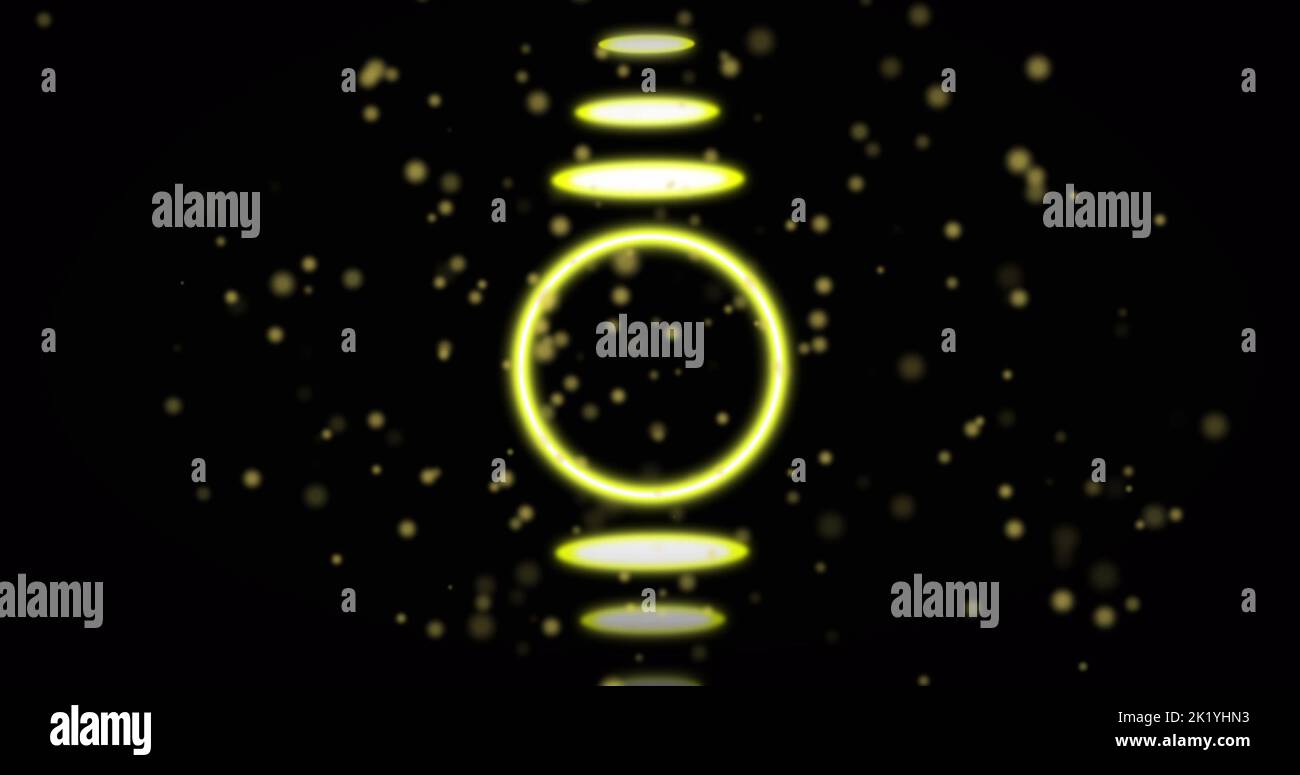 Images of moving yellow glowing shapes over black background Stock ...