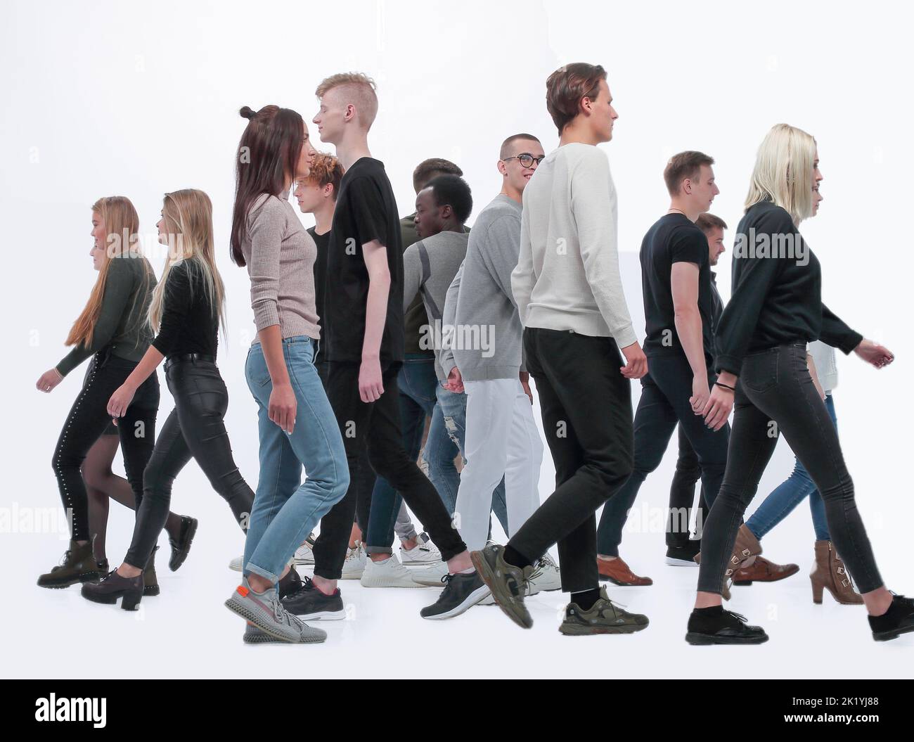casual young people walking in different directions Stock Photo - Alamy